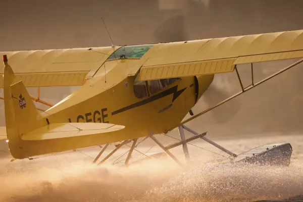 Glass Place Mat of A seaplane taking off in Como Lake at sunset