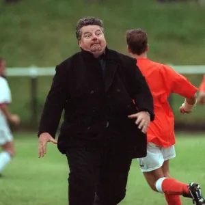 Robbie Coltrane actor pictured in a Mini Circa 1990s